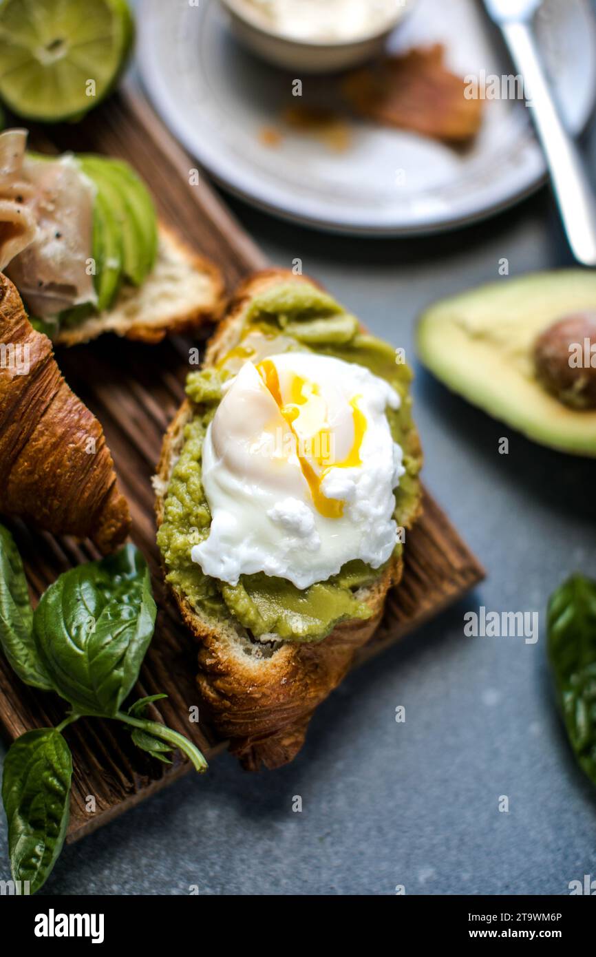Croissant sandwiches with jamon ham serrano paleta iberica, avocado ...