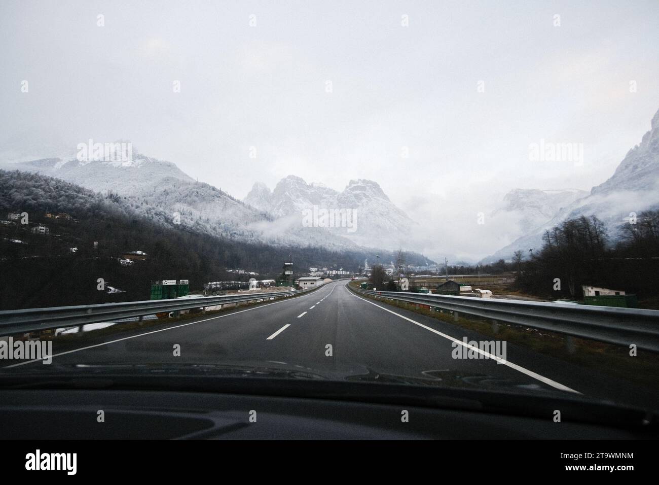 Driving on freeway to mountains Stock Photo - Alamy