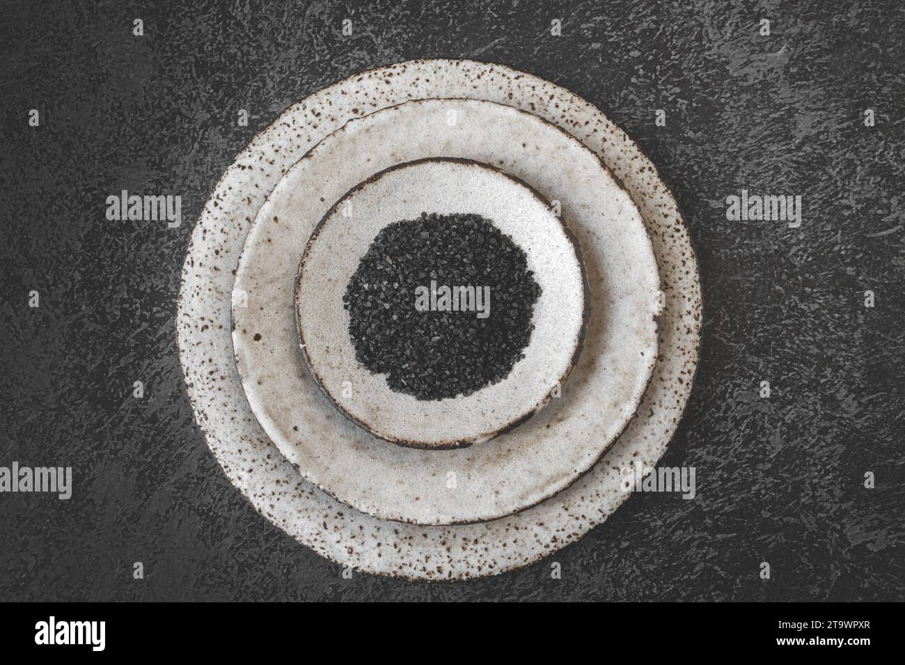 Coal salt. Black Himalayan salt. Russian Thursday rye salt. Top view of ...