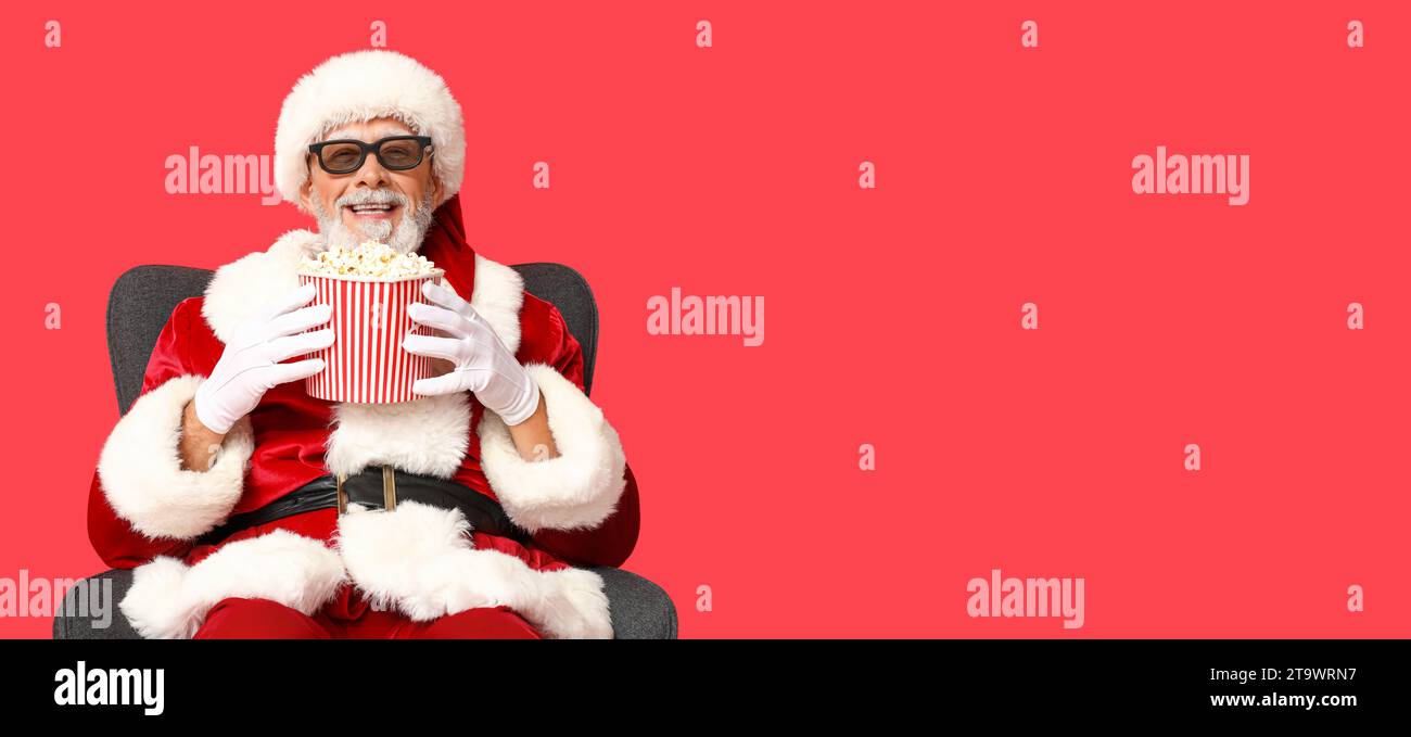 Santa Claus with popcorn watching Christmas movie against red ...