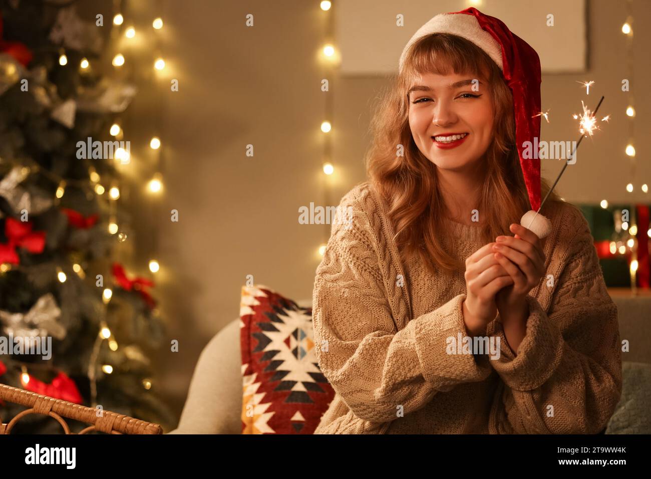 Joyful woman in santa hi-res stock photography and images - Alamy