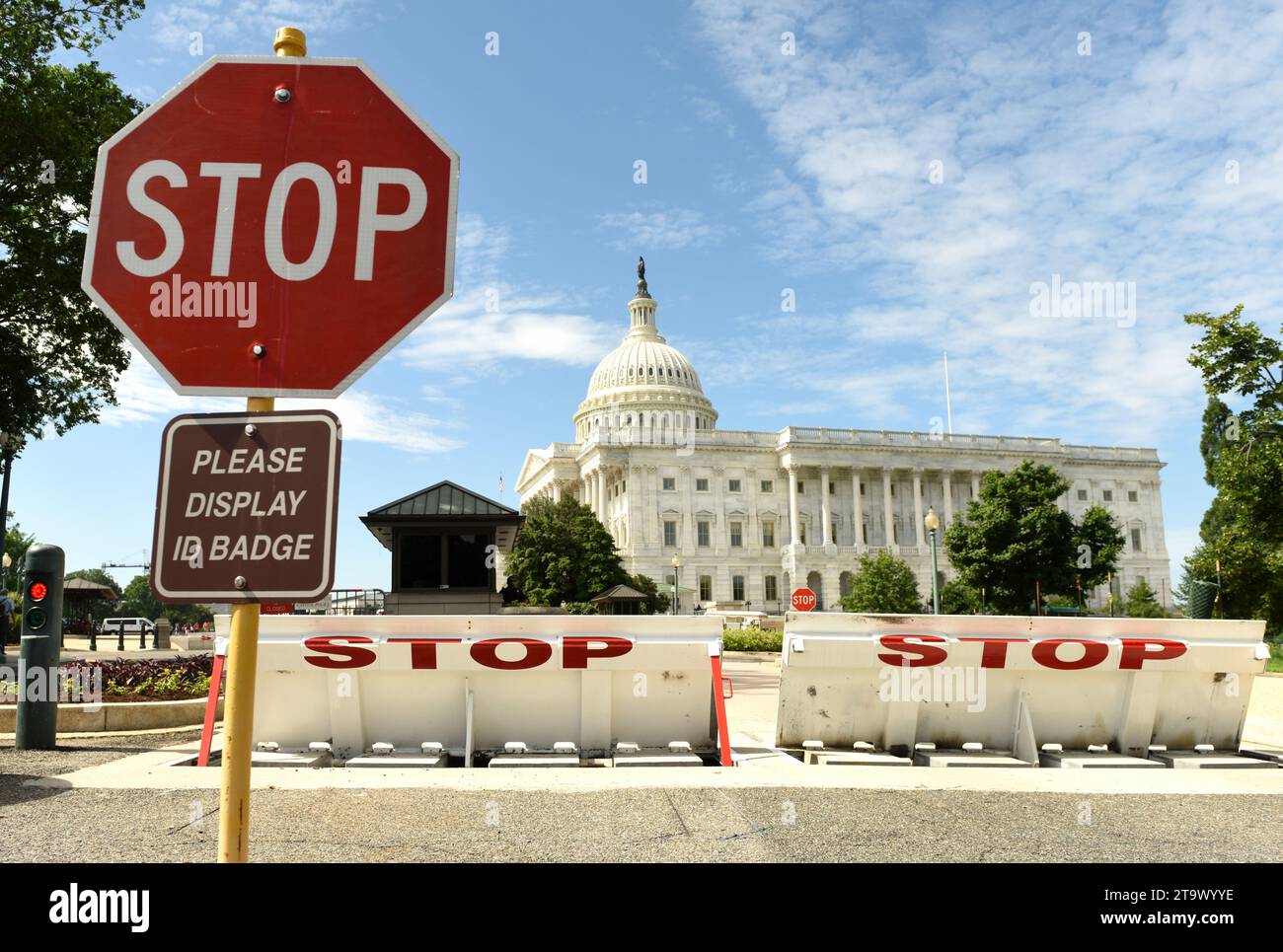 Washington, DC - June 01, 2018: Safety barriers and stop sign in front ...