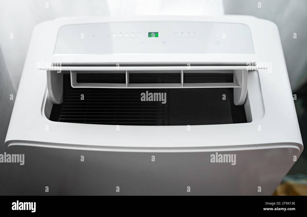 Modern floor standing mobile air conditioner Stock Photo - Alamy