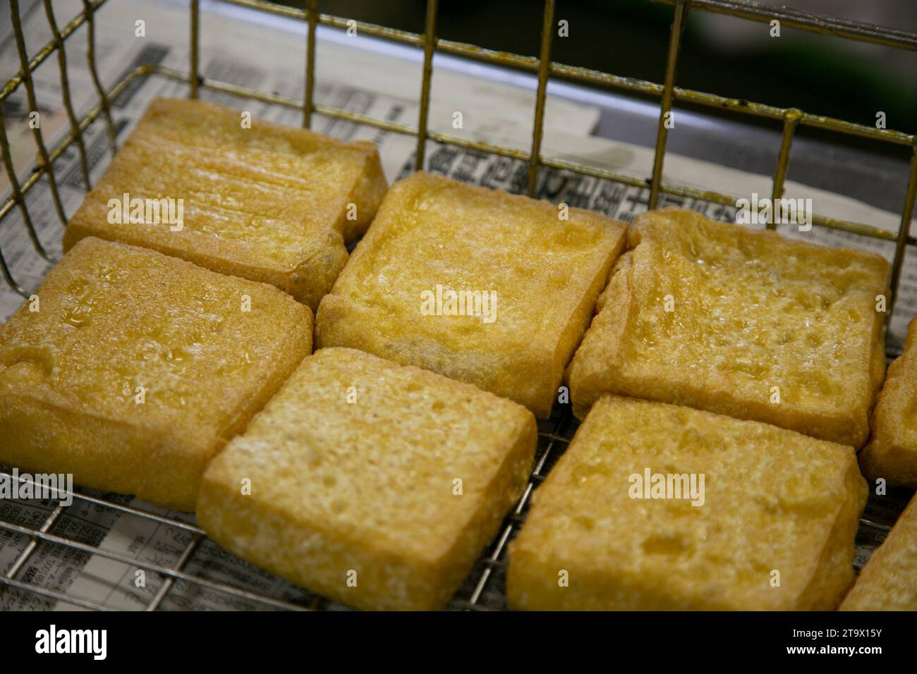 Deep fried fresh tofu portions prepared in a Tofu Shop in Shizuoka ...