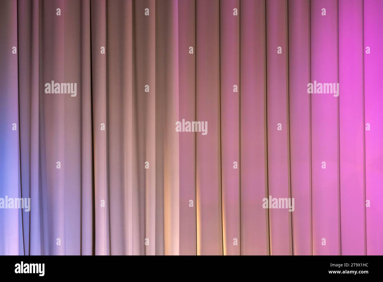 Closed theatrical curtain with pink spot lights, background photo ...