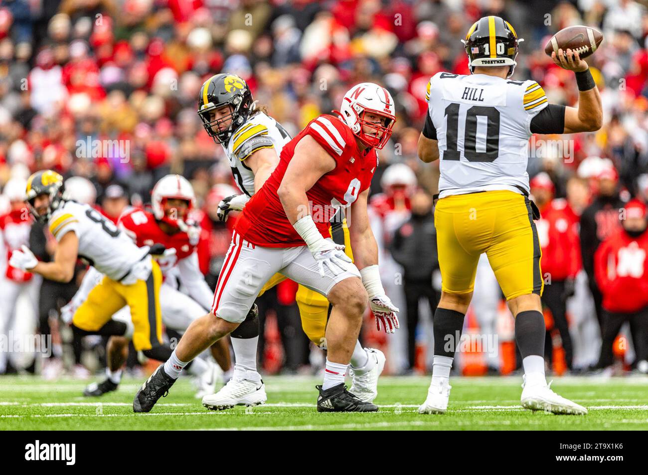 Lincoln, NE. U.S. 24th Nov, 2023. Nebraska Cornhuskers defensive lineman Ty Robinson (9) rushes ...