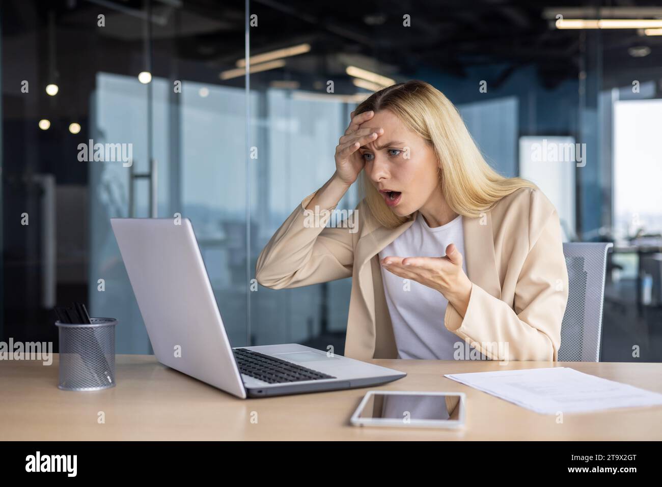 Frustrated sad upset woman working inside office, business woman got ...