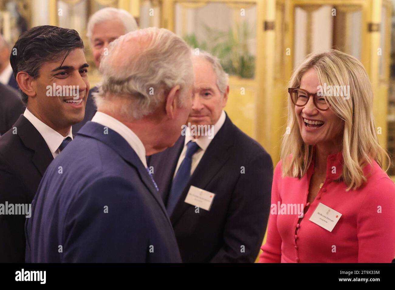 King Charles III (left) and Prime Minister Rishi Sunak speak with Chief ...