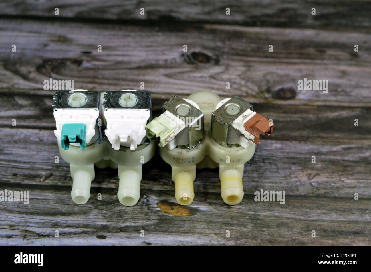 A broken and a new inlet water valves of automatic electric washing ...