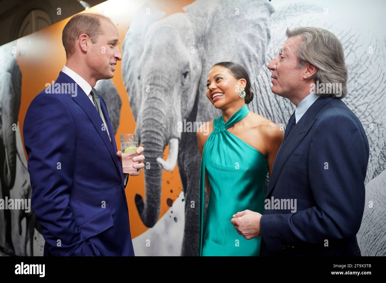 Britain's Prince William speaks with Ceawlin Thynn, 8th Marquess of Bath, right, and Emma Thynn ...