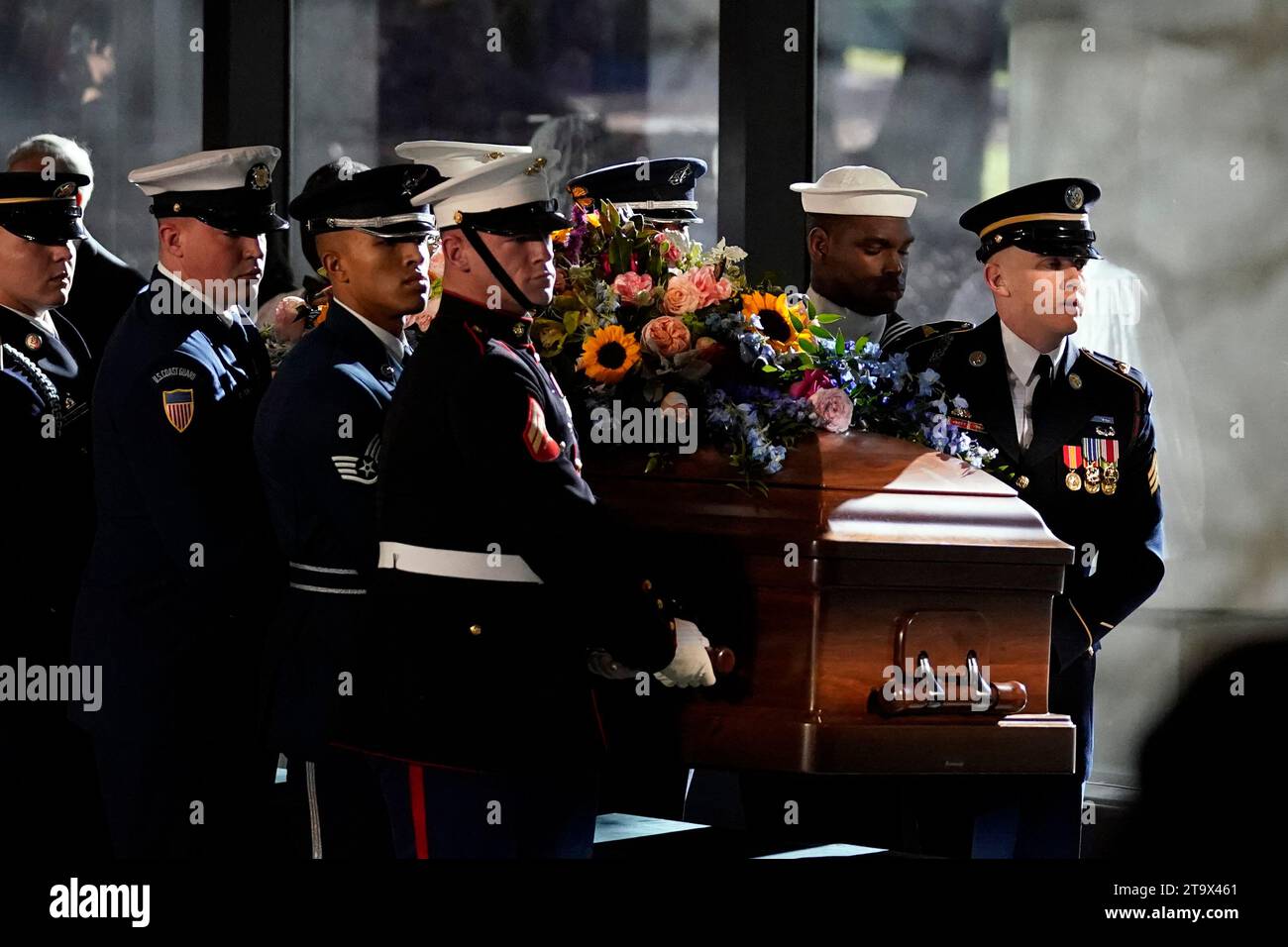 The casket of former first lady Rosalynn Carter is moved into place for ...
