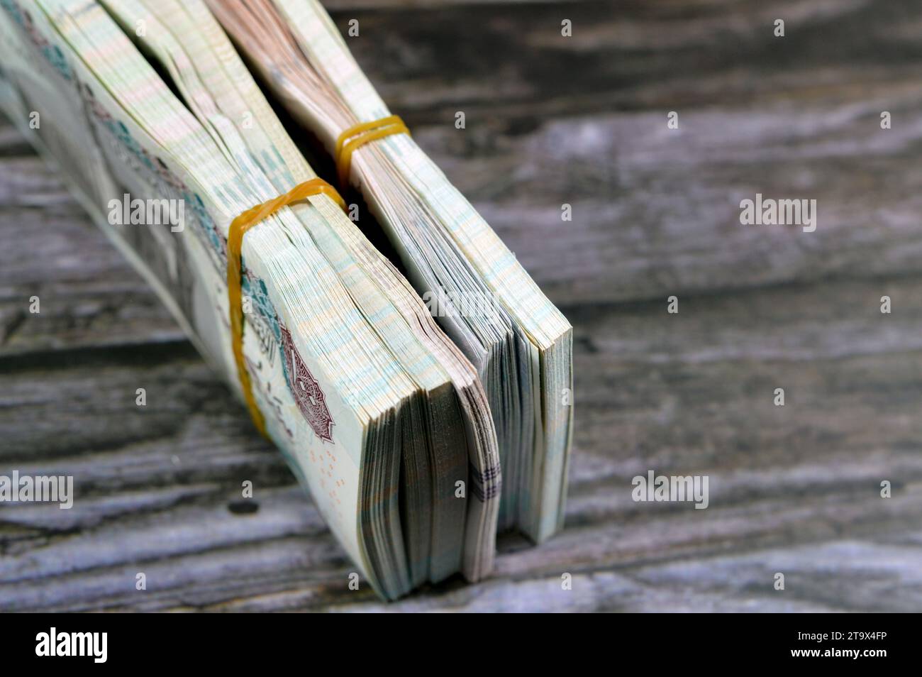 Stacks of Egypt money banknote bills of 200 EGP LE, 100 and 50 EGP LE ...