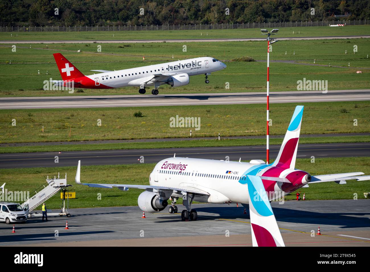 Düsseldorf Airport, Helvetic Airways Embraer E190-E2, on take-off ...