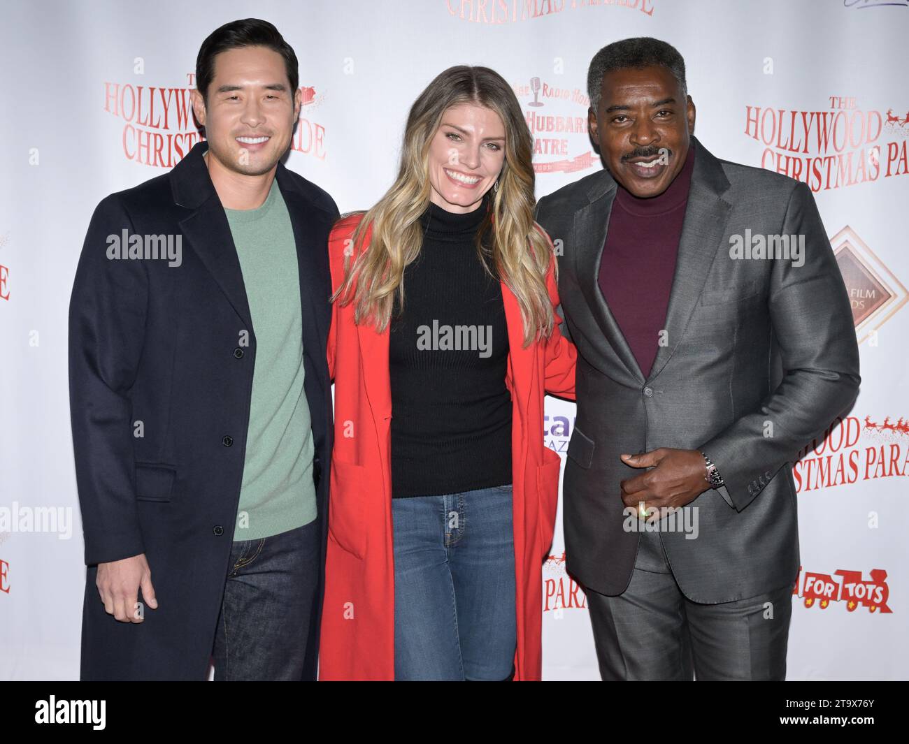 26 November 2023 - Hollywood, California - (L-R) Raymond Lee, Caitlin ...