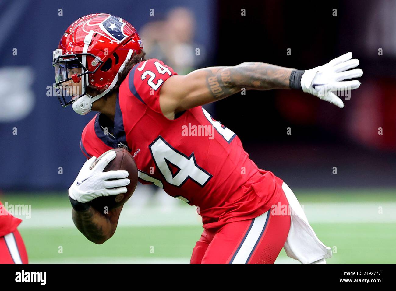 Houston, Texas, USA. 26th Nov, 2023. Houston Texans cornerback Derek Stingley Jr. (24) carries ...