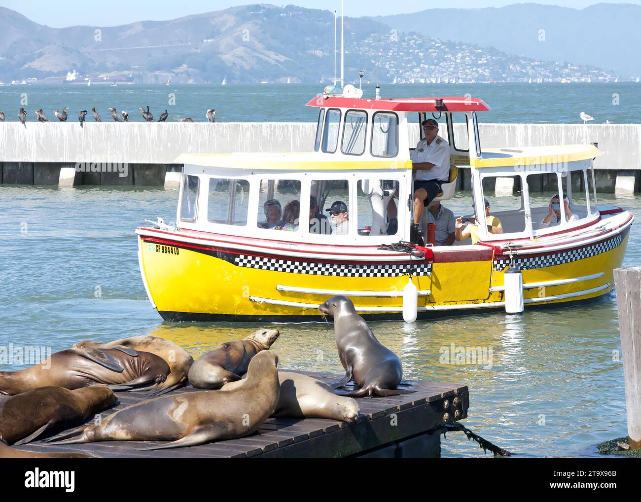 San Francisco, CA - Sept 28, 2023: Small tour boat brings toruists in ...