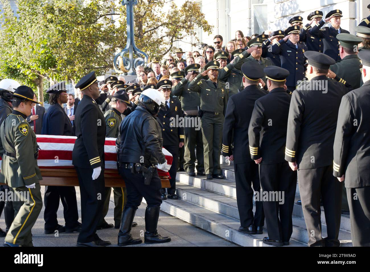 San Francisco, CA - Oct 4, 2023: Police and Fire Fighters stand at ...