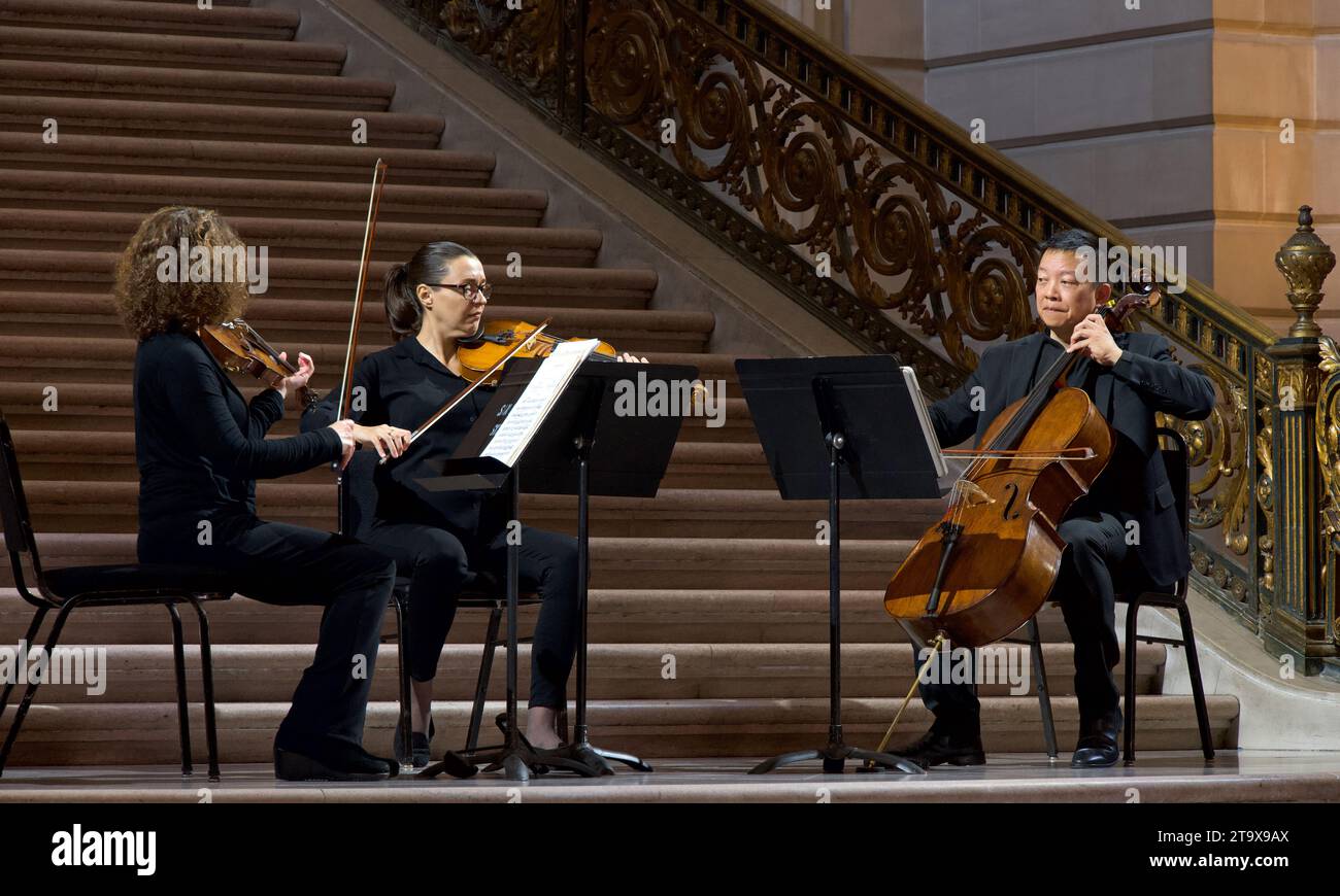 San Francisco, CA - Oct 4, 2023: Members of an orchestra playing while ...