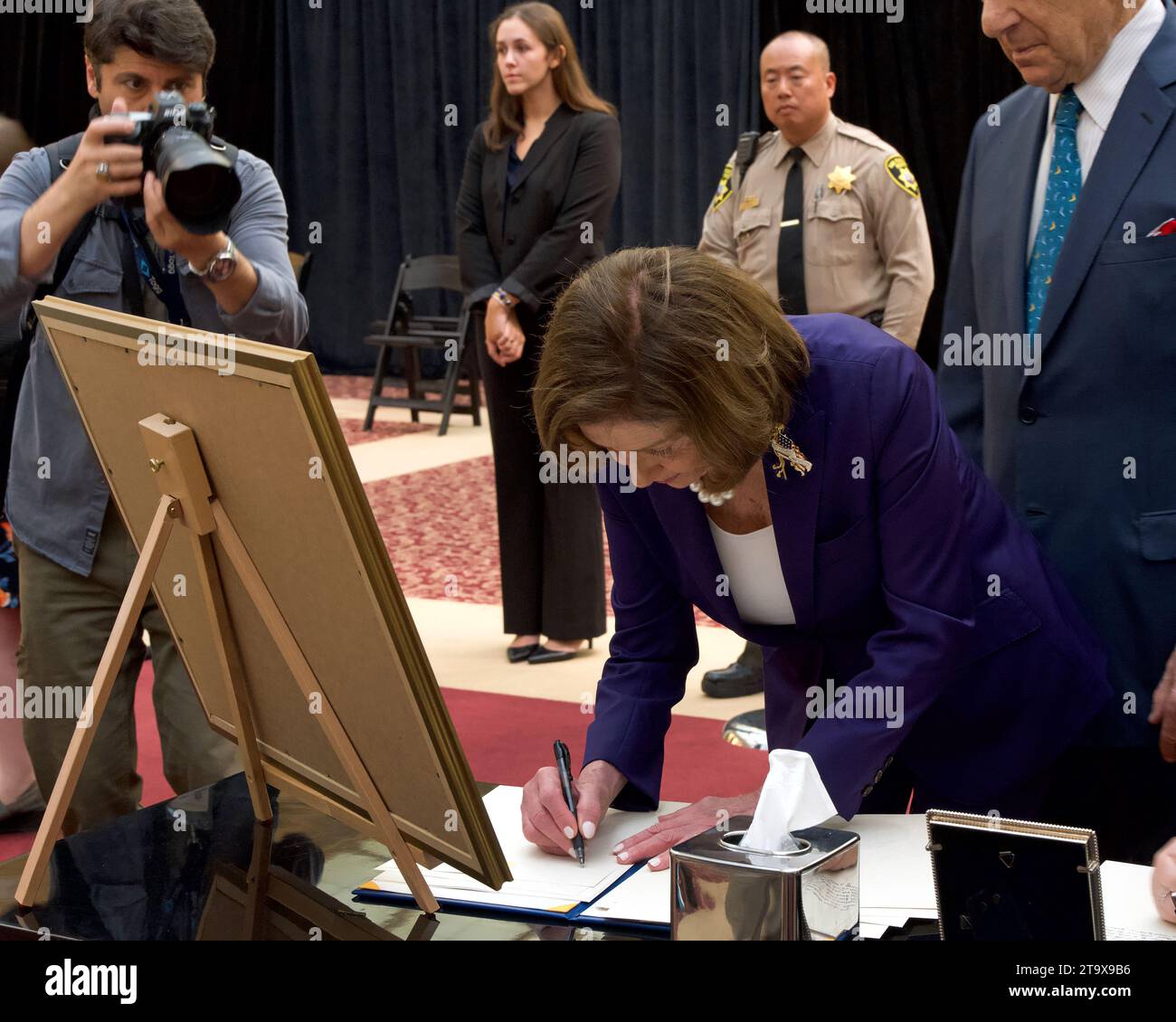 San Francisco, CA - Oct 4, 2023: Nancy Pelosi signing the remembrance ...