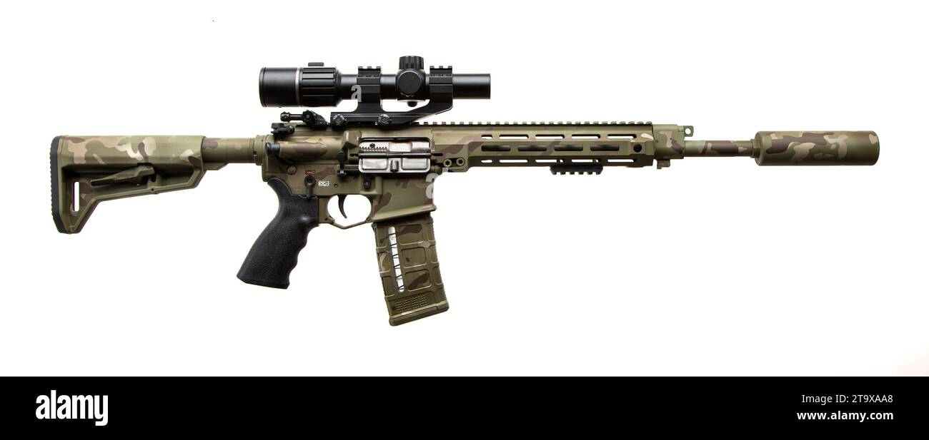 A modern carbine with an optical sight and a silencer. Weapons in ...