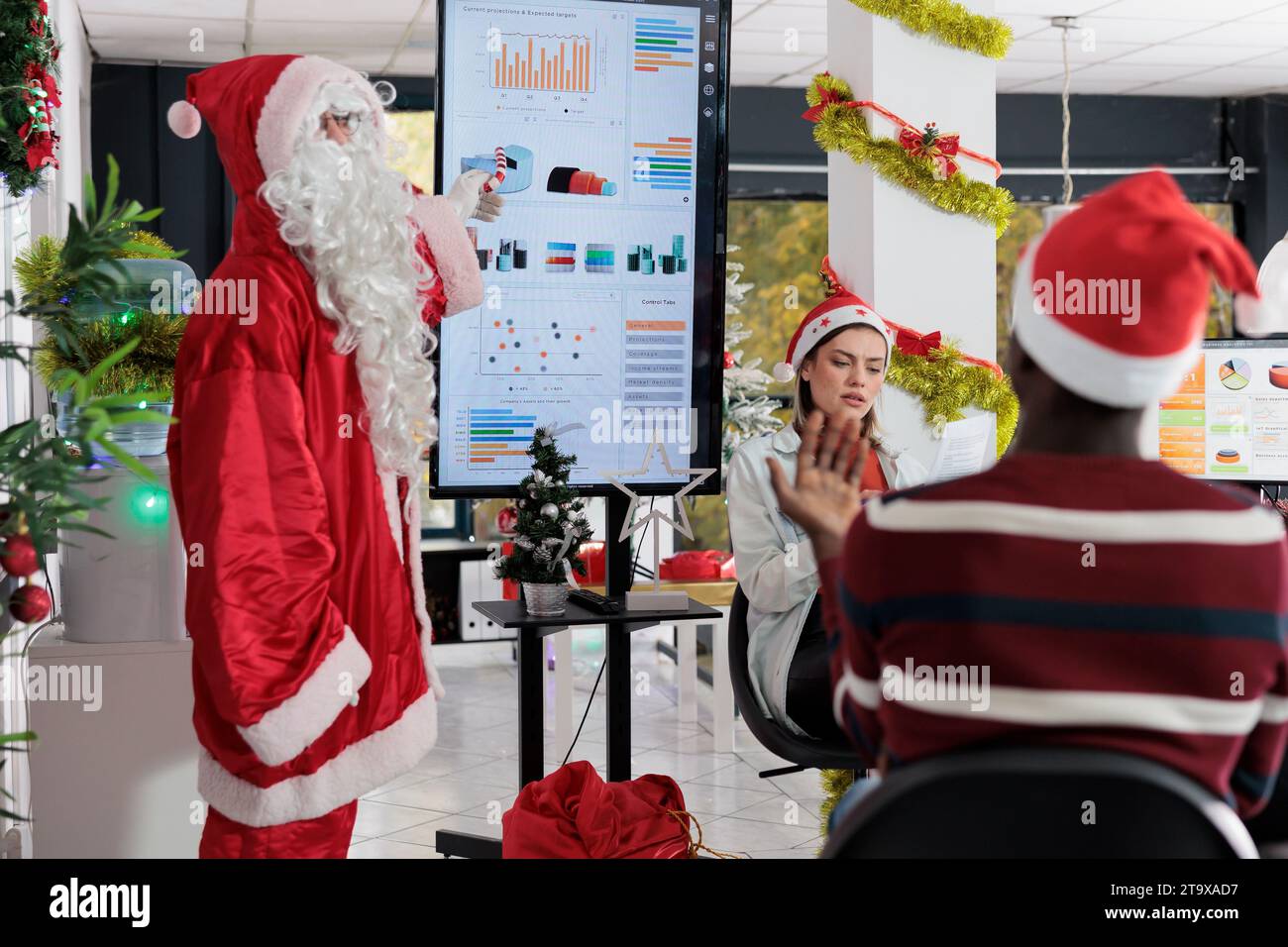 Licensed expert dressed as Santa Claus inspiring businessmen to advance ...