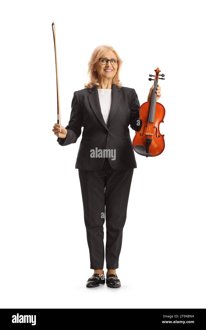 Full length shot of an artist holding a violin and a fiddle isolated on ...