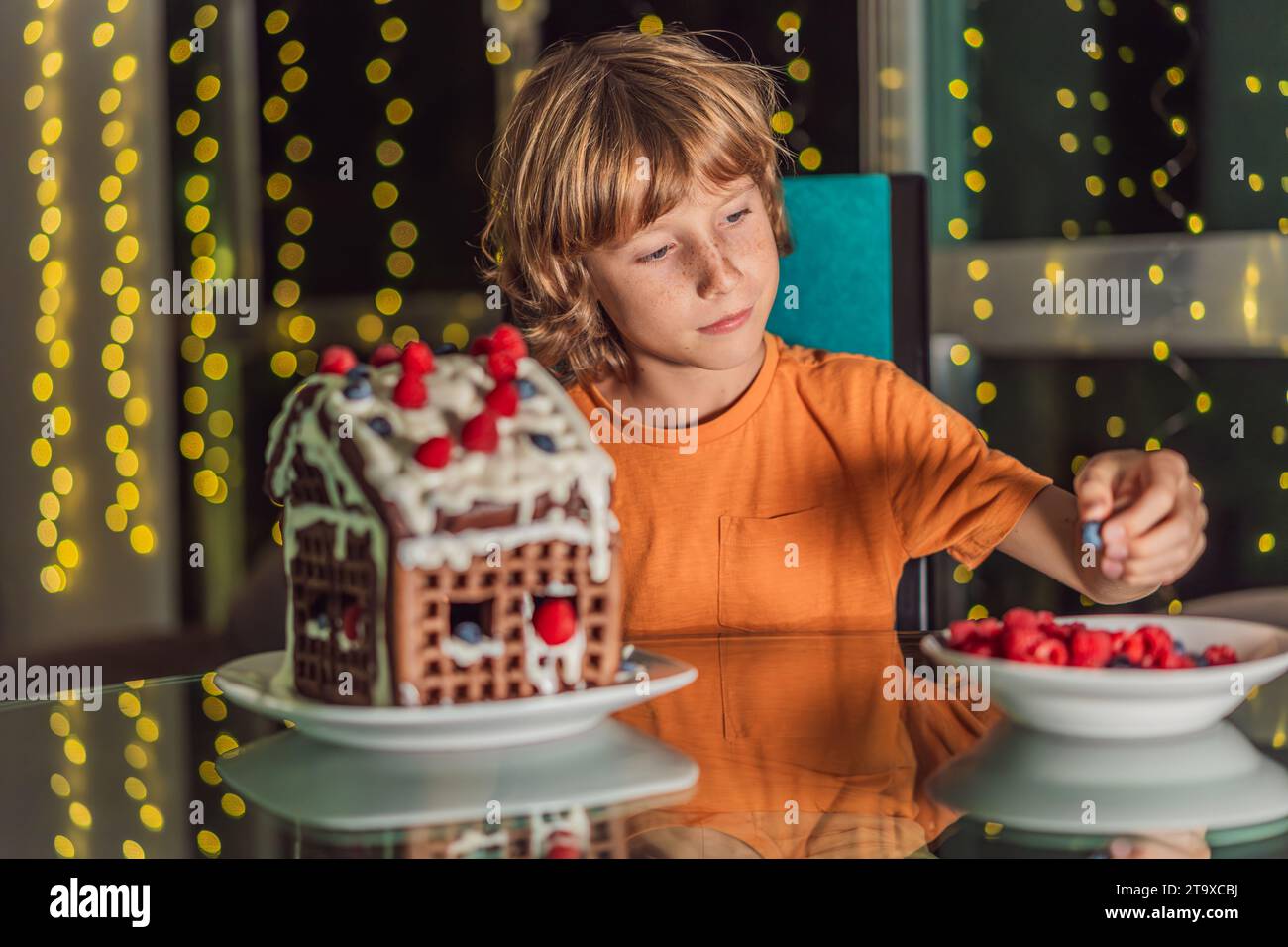 Immerse in festive delight as a boy crafts boy crafting an ...