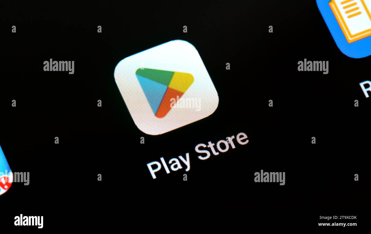 Google Play Store app application software logo icon on a smartphone tablet mobile phone device ...