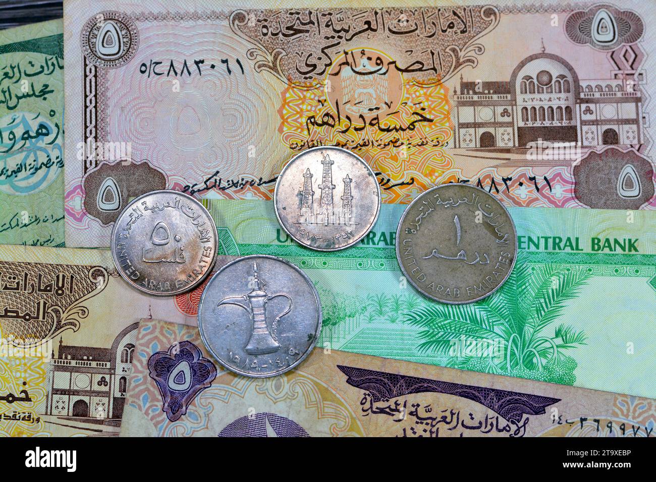 United Arab of Emirates money background of old coins and banknotes of ...