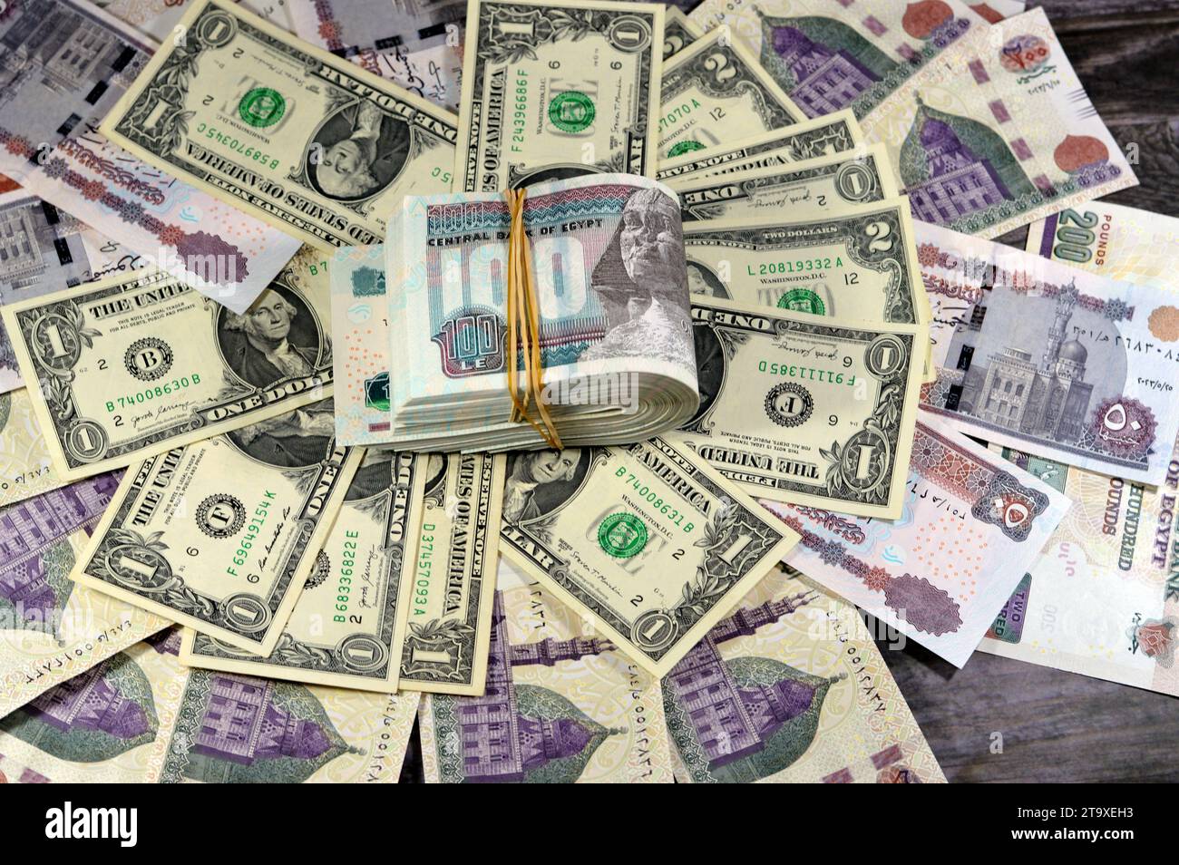 Folded Egyptian money banknote bills of 100, 200, 50 EGP LE one and two ...