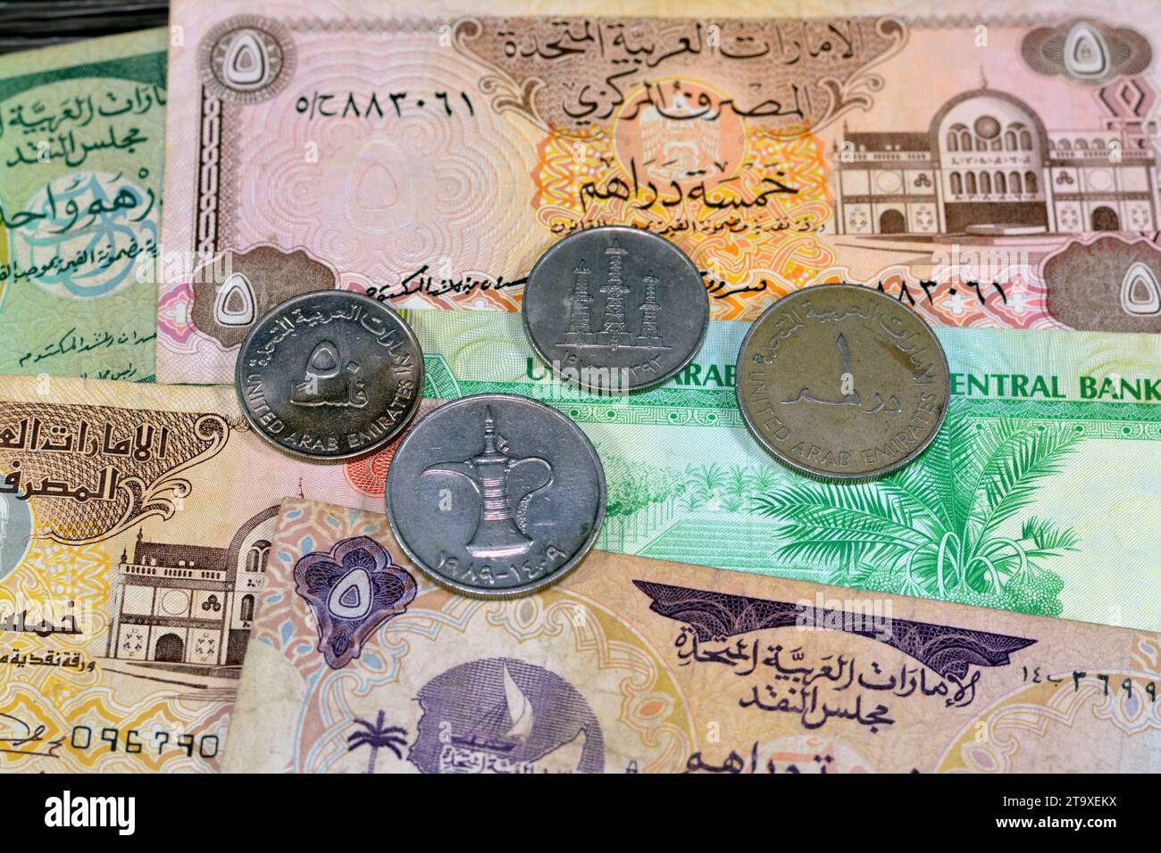 United Arab of Emirates money background of old coins and banknotes of ...
