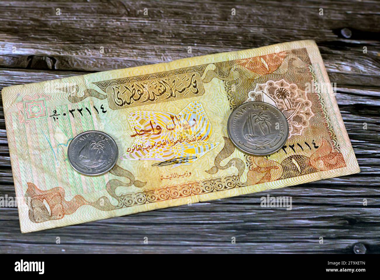 Qatari Money, money background of old coins and banknotes of riyals of ...