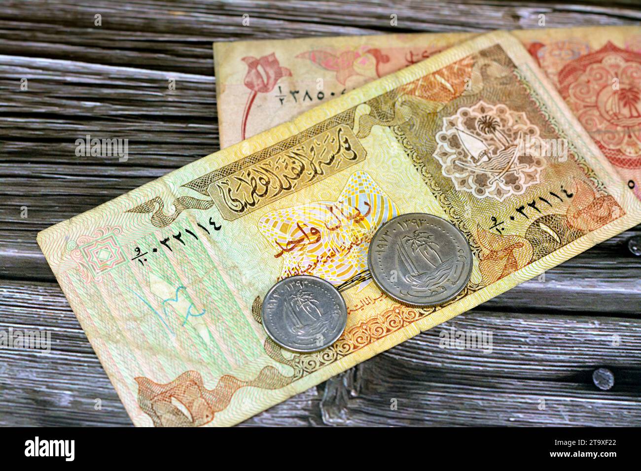 Qatari Money, money background of old coins and banknotes of riyals of ...