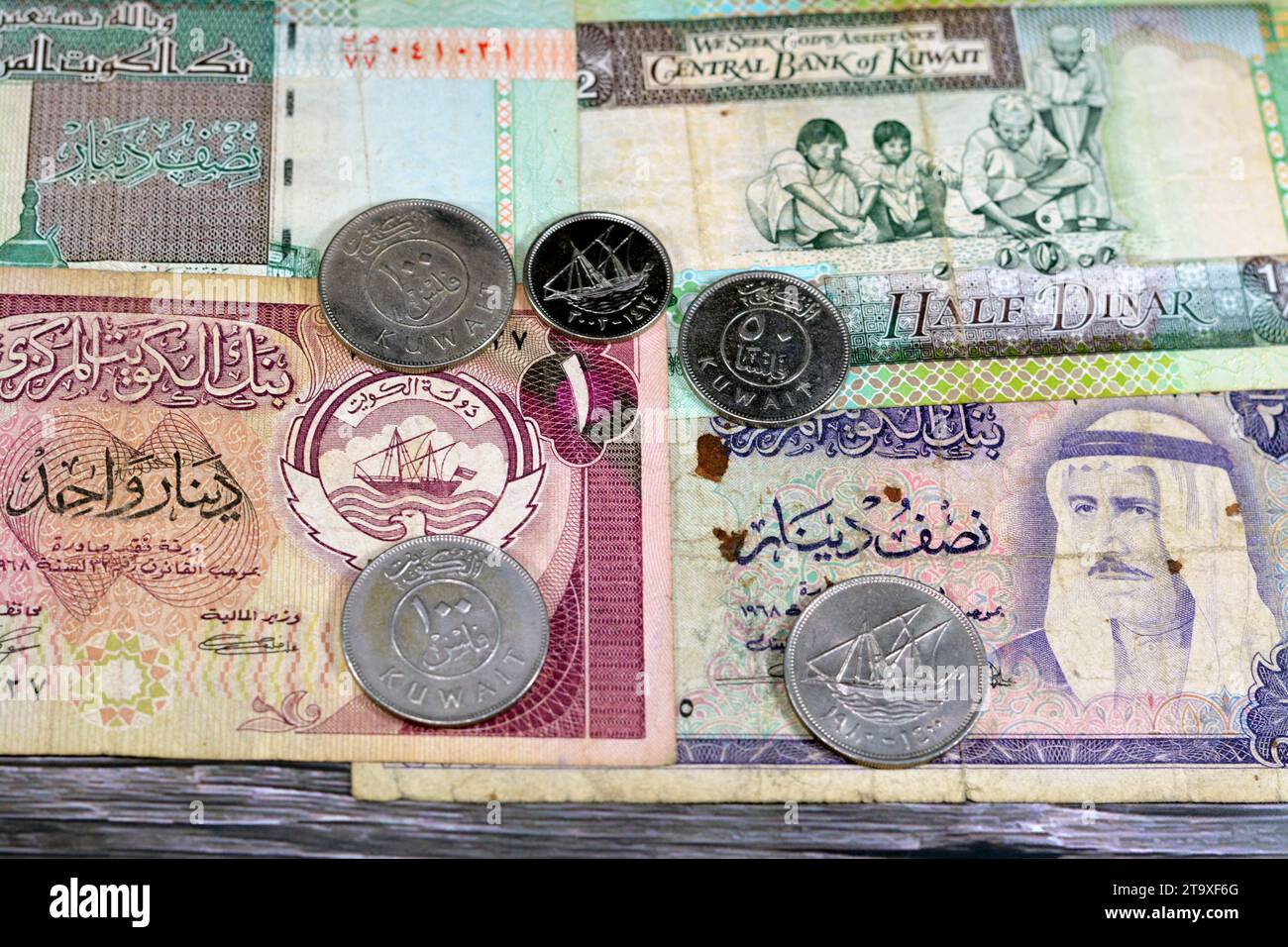 Kuwaiti money background of old coins and banknotes of Dinars of ...