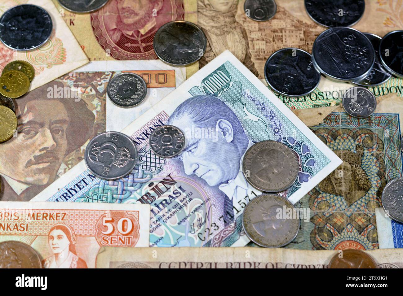 Old money currency of banknotes and coins from different countries of ...