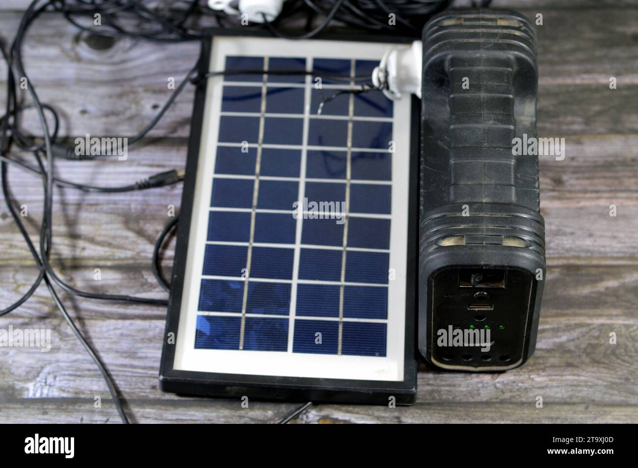 A multi purpose battery charged with a solar panel, a device that ...
