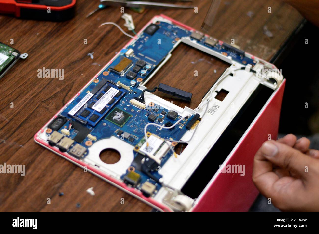Cairo, Egypt, November 1 2023: maintenance of a laptop, fixing a ...