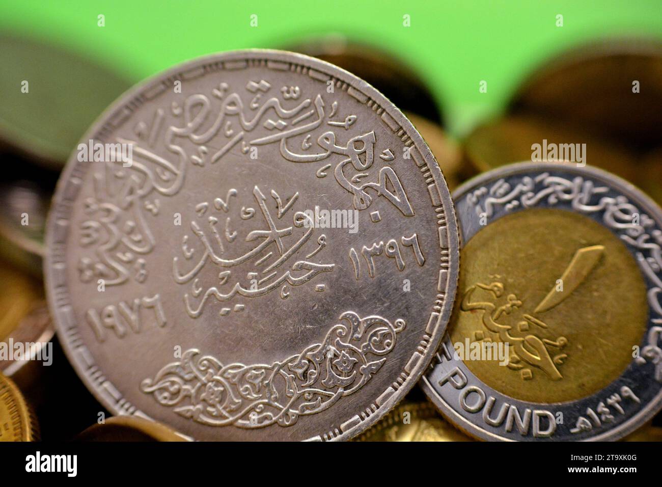 A new and old Egyptian One 1 EGP LE pound coins, a commemorative silver ...