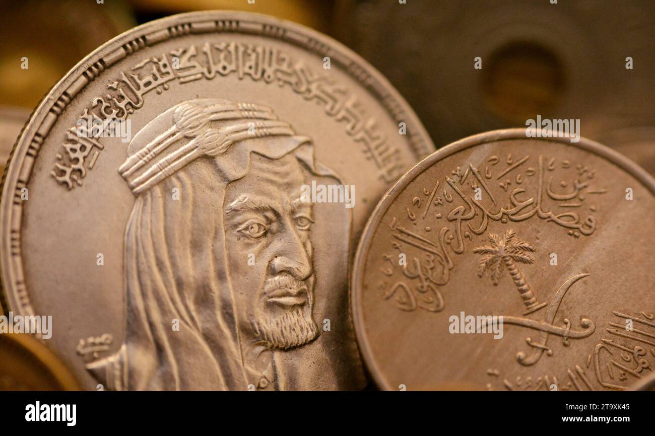 An old vintage retro Saudi Arabia coin at the Era of king Faisal, An ...
