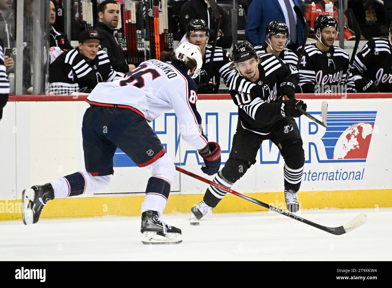 New Jersey Devils right wing Alexander Holtz (10) passes the puck as ...