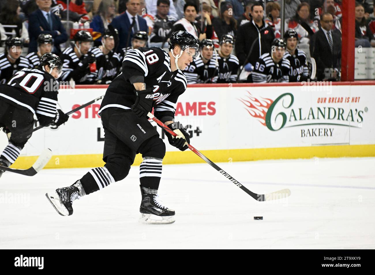 New Jersey Devils left wing Ondrej Palat (18) looks to pass the puck ...