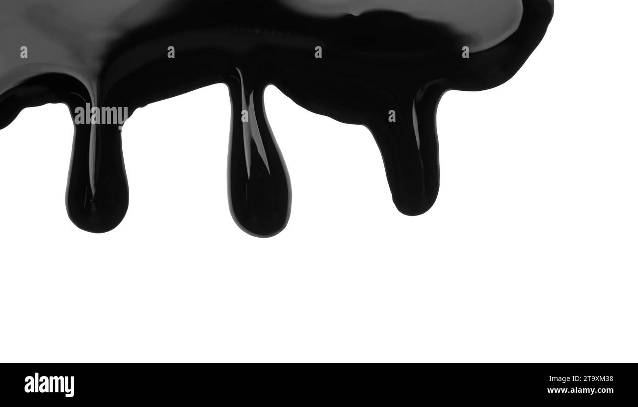 Black viscous liquid flowing on white background Stock Photo - Alamy