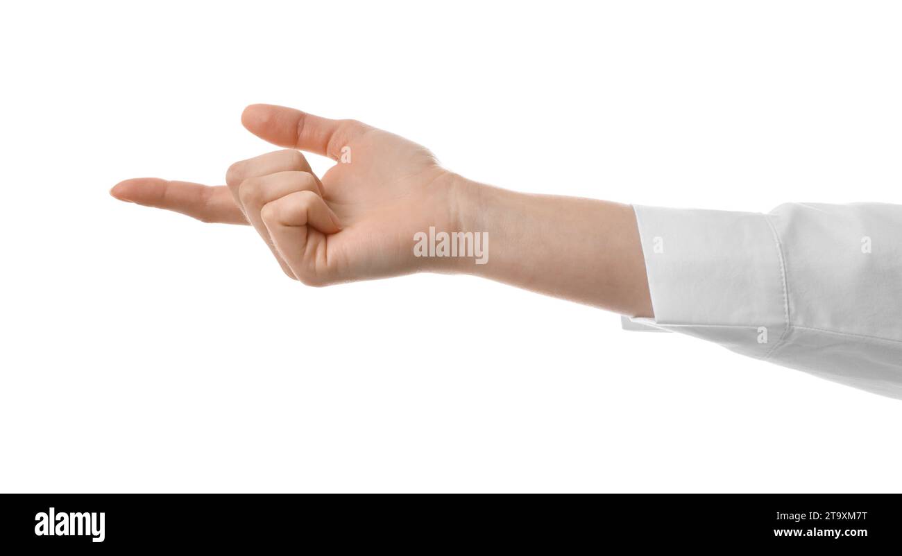 Woman pointing with index finger on white background, closeup ...