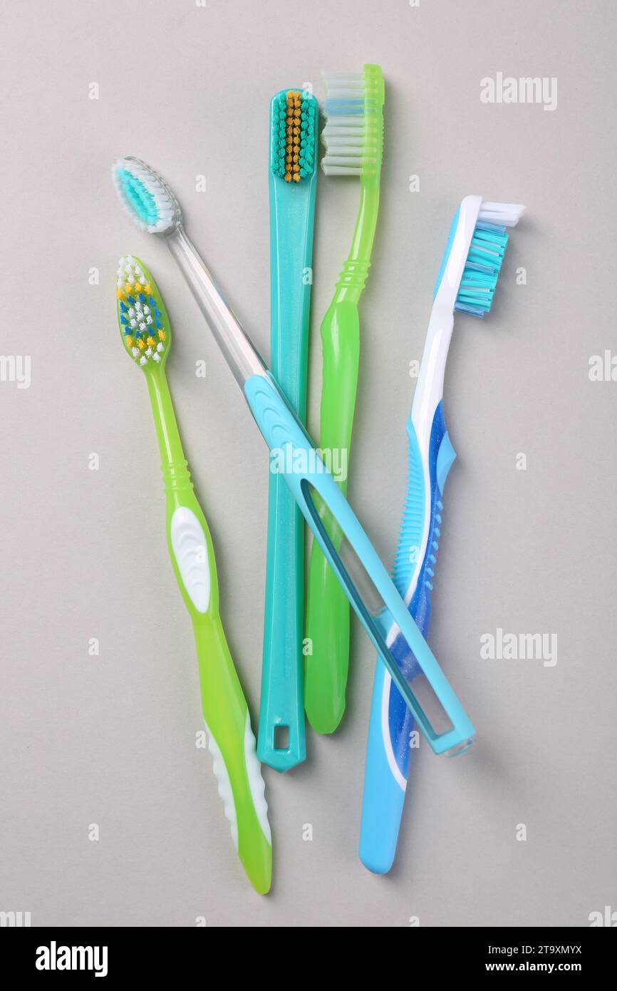 Many different toothbrushes on light background, flat lay Stock Photo ...