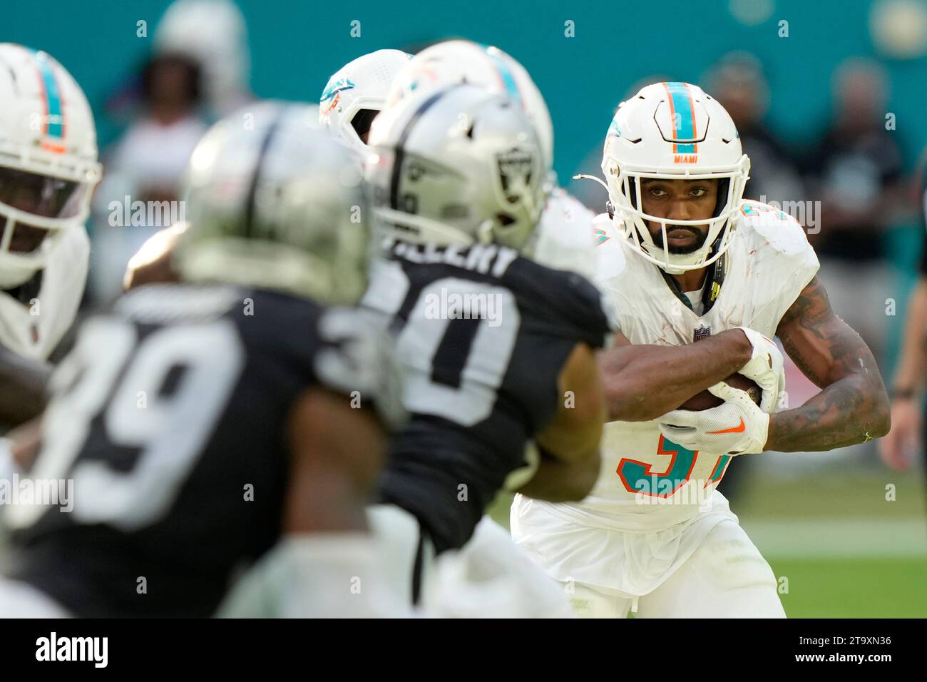 Miami Dolphins running back Raheem Mostert looks for an opening during ...
