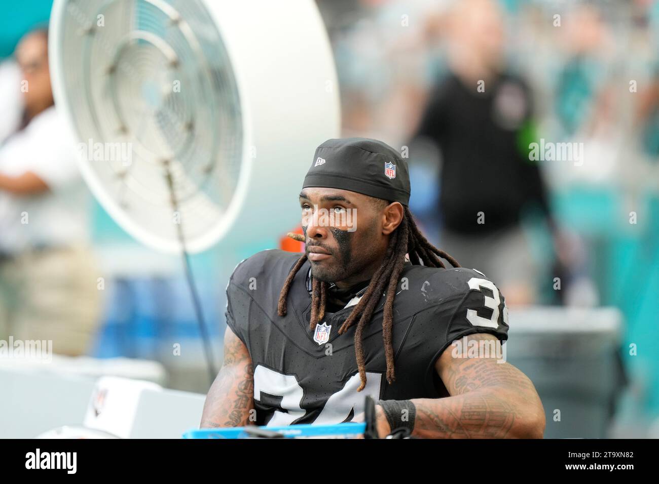 Las Vegas Raiders running back Brandon Bolden sits on the bench during ...