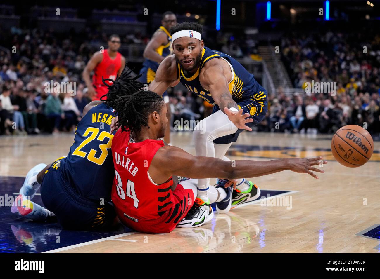 Portland Trail Blazers forward Jabari Walker (34) makes a pass under ...