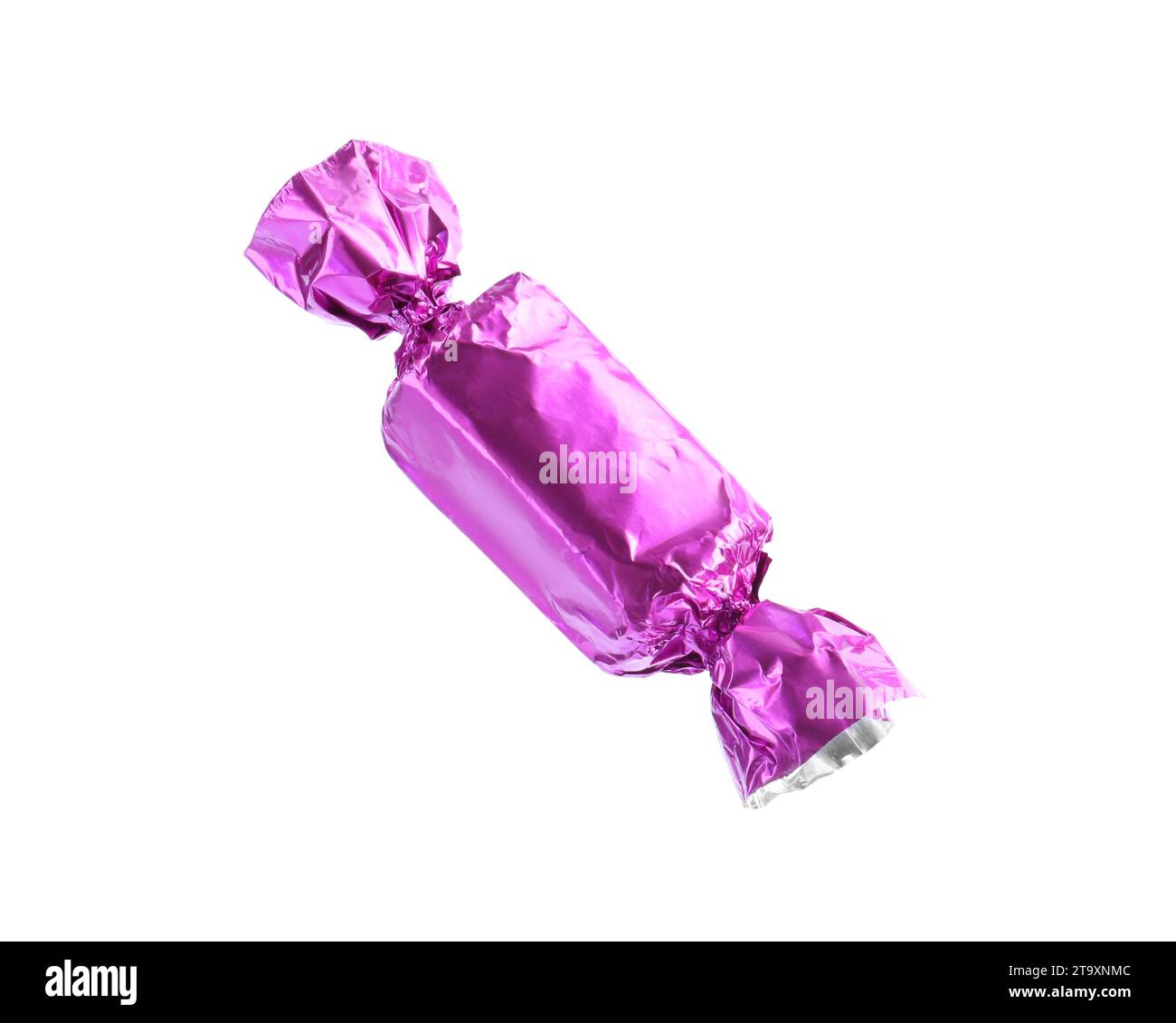 Tasty candy in violet wrapper isolated on white Stock Photo - Alamy
