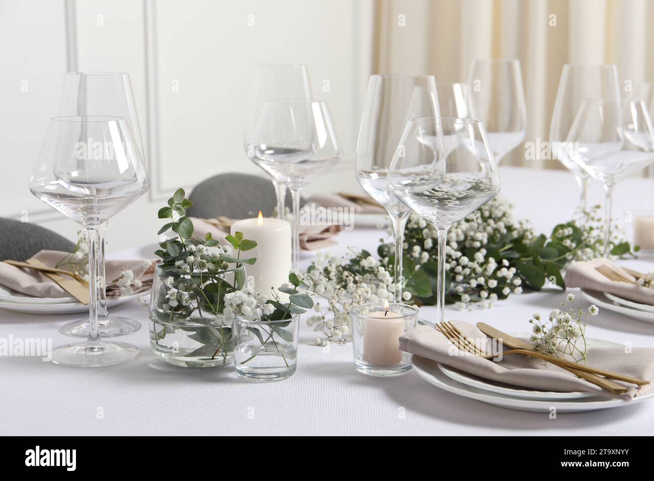 Beautiful table setting with floral decor indoors Stock Photo - Alamy