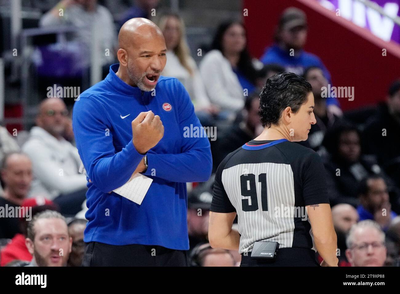 Detroit Pistons head coach Monty Williams talks with referee Che Flores ...